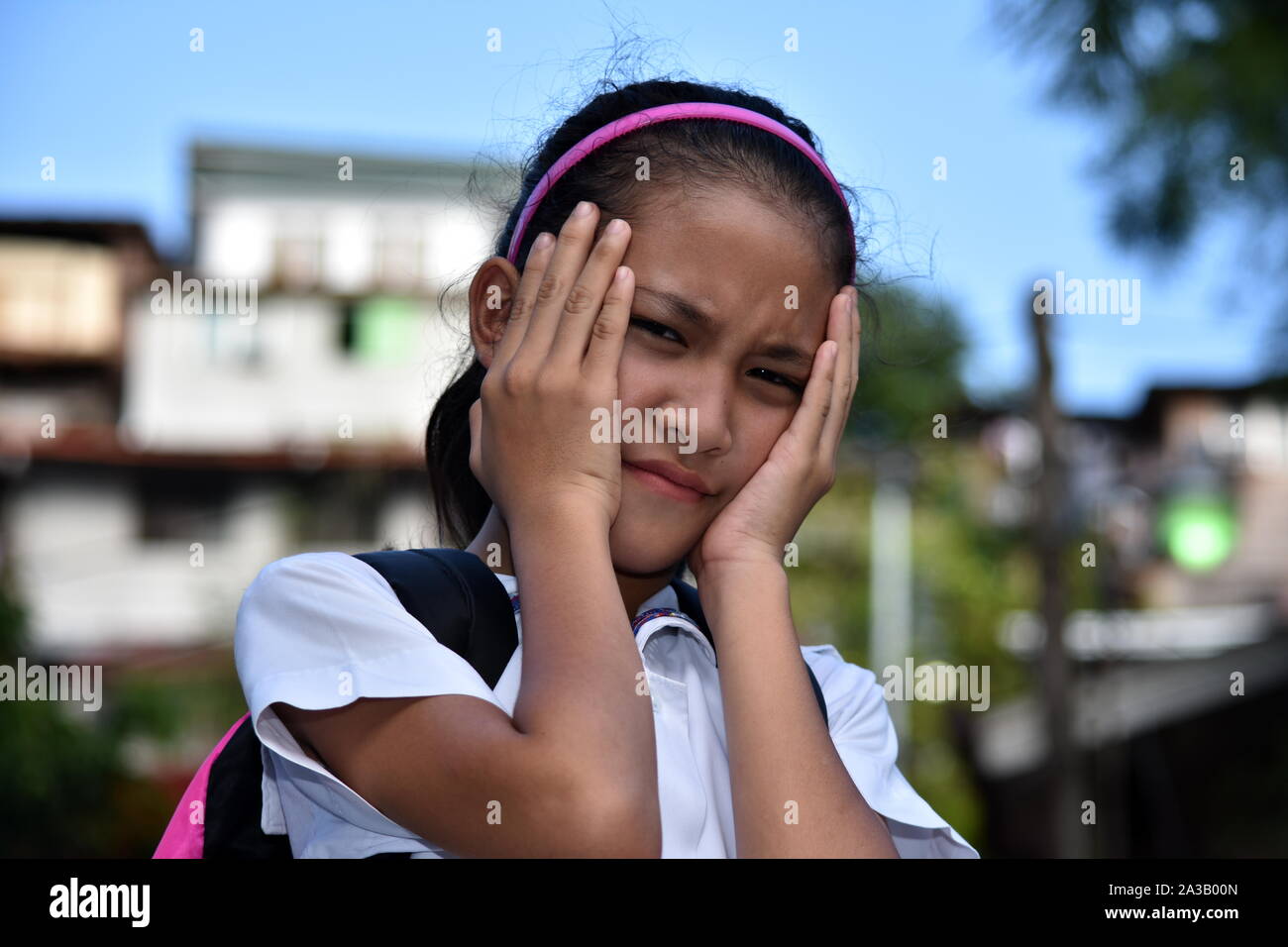 Stressful Asian Female Student With Books Stock Photo - Alamy