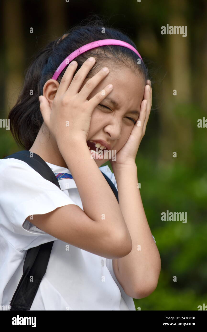 Young Minority School Girl Under Stress Stock Photo - Alamy