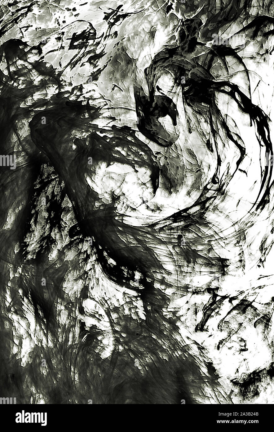 Black and white photograph abstract shapes formed by ink droplets ...