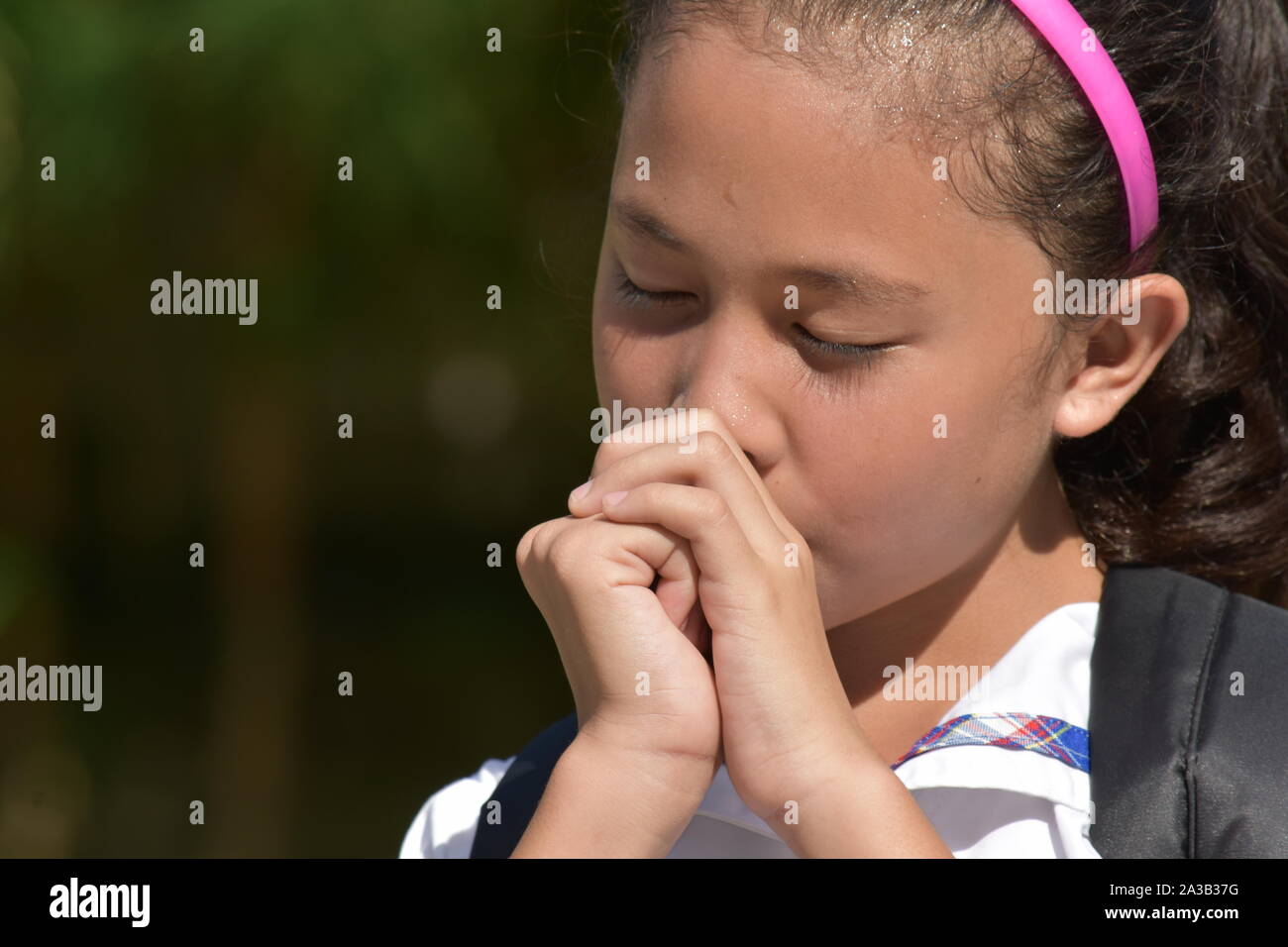 Beautiful Asian Student Teenager School Girl Praying With Books Stock ...