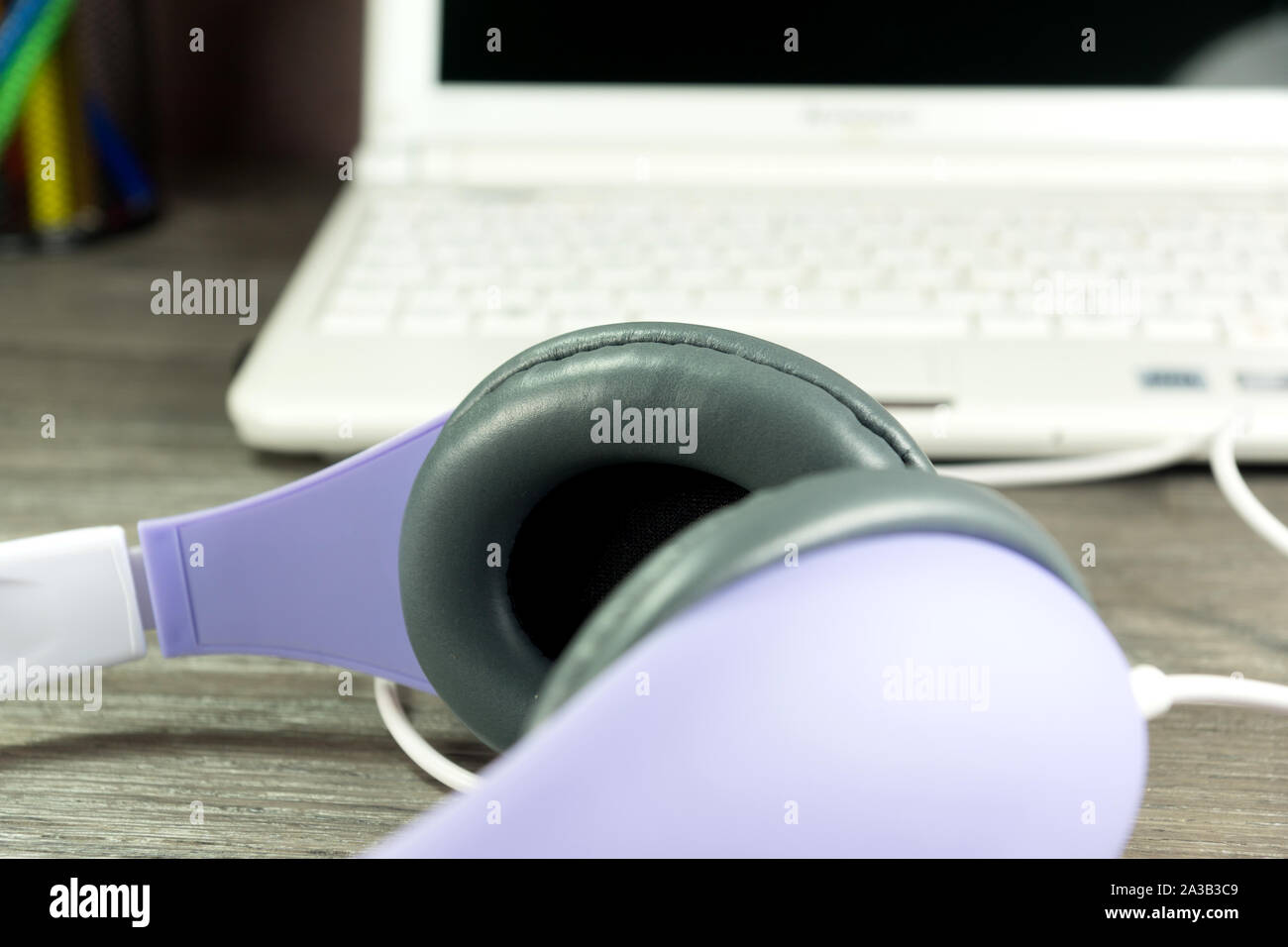 Computer and headphones Stock Photo - Alamy