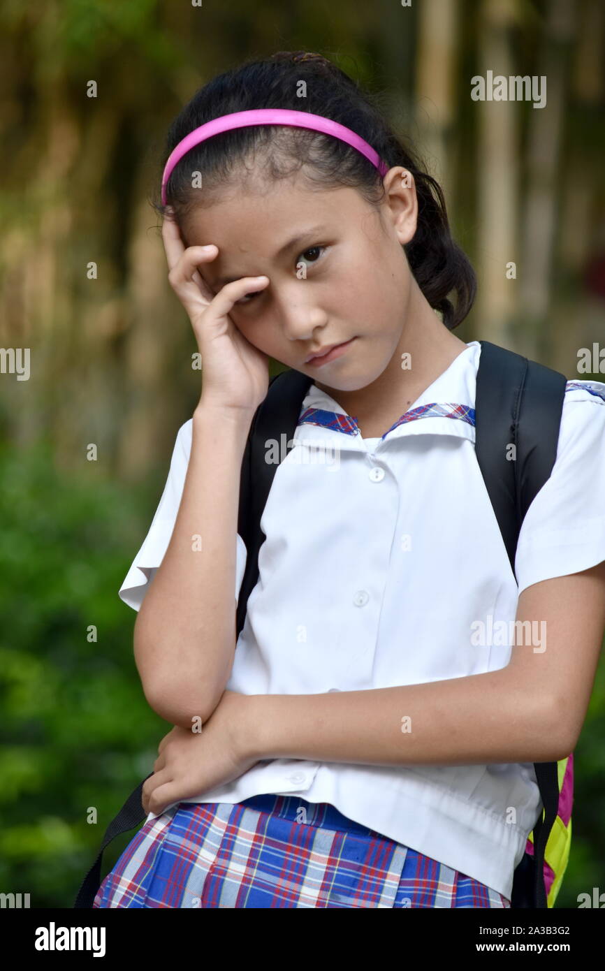 A Diverse Female Student Wondering Stock Photo - Alamy