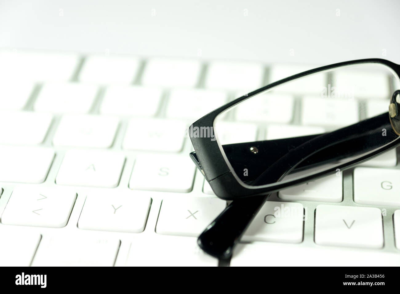 Laptop eyeglasses hi-res stock photography and images - Alamy