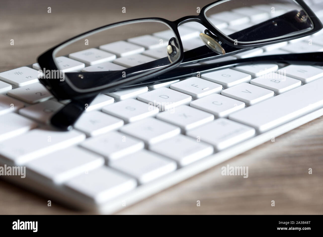 Laptop eyeglasses hi-res stock photography and images - Alamy