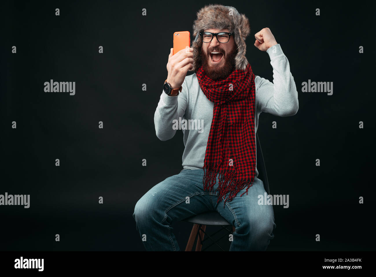 Man sitting in chair screaming hi-res stock photography and images - Alamy