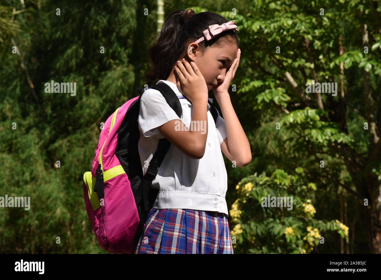 Worried girl uniform hi-res stock photography and images - Alamy
