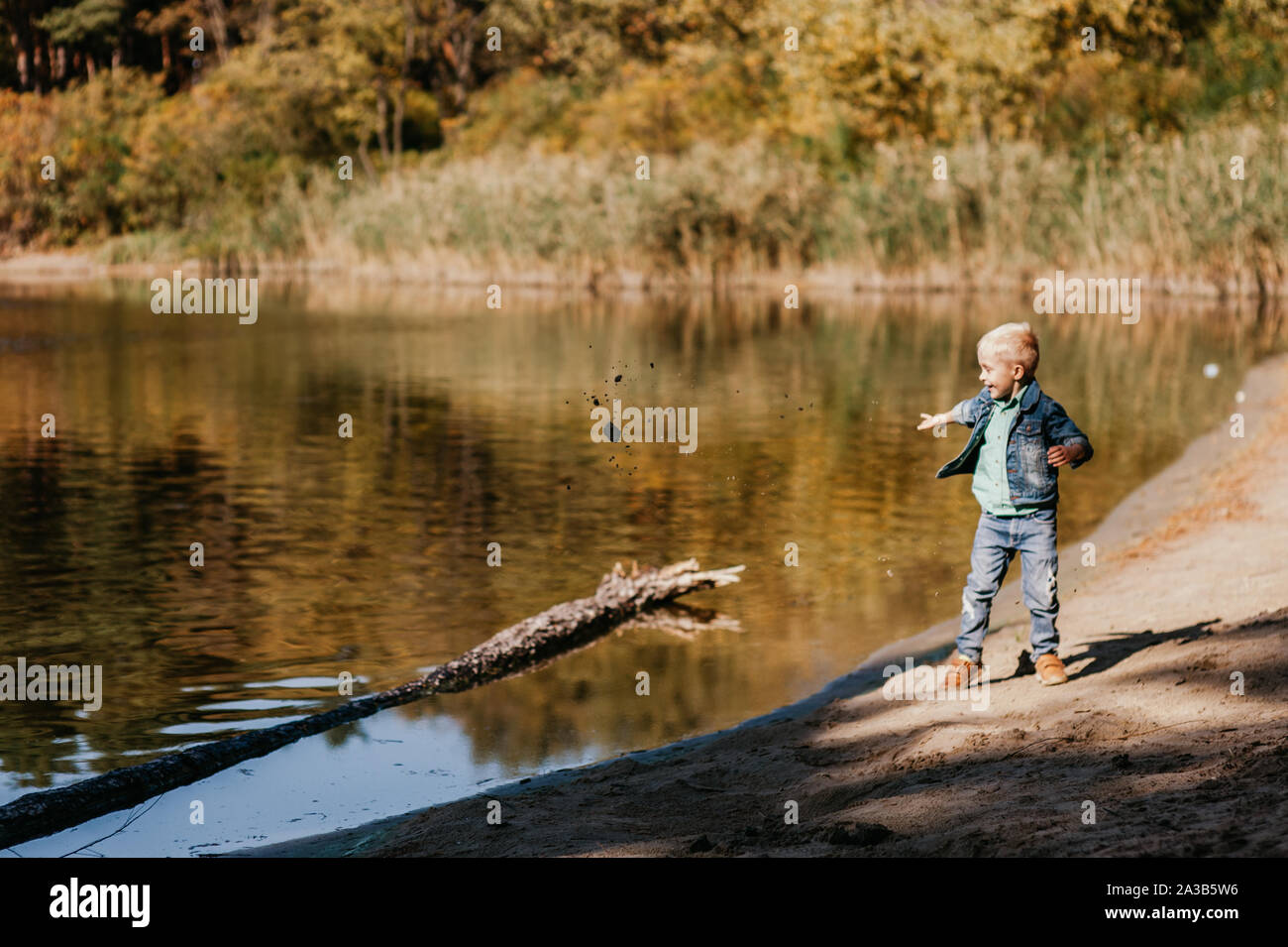 Kids Playing On River Bank High Resolution Stock Photography and Images ...