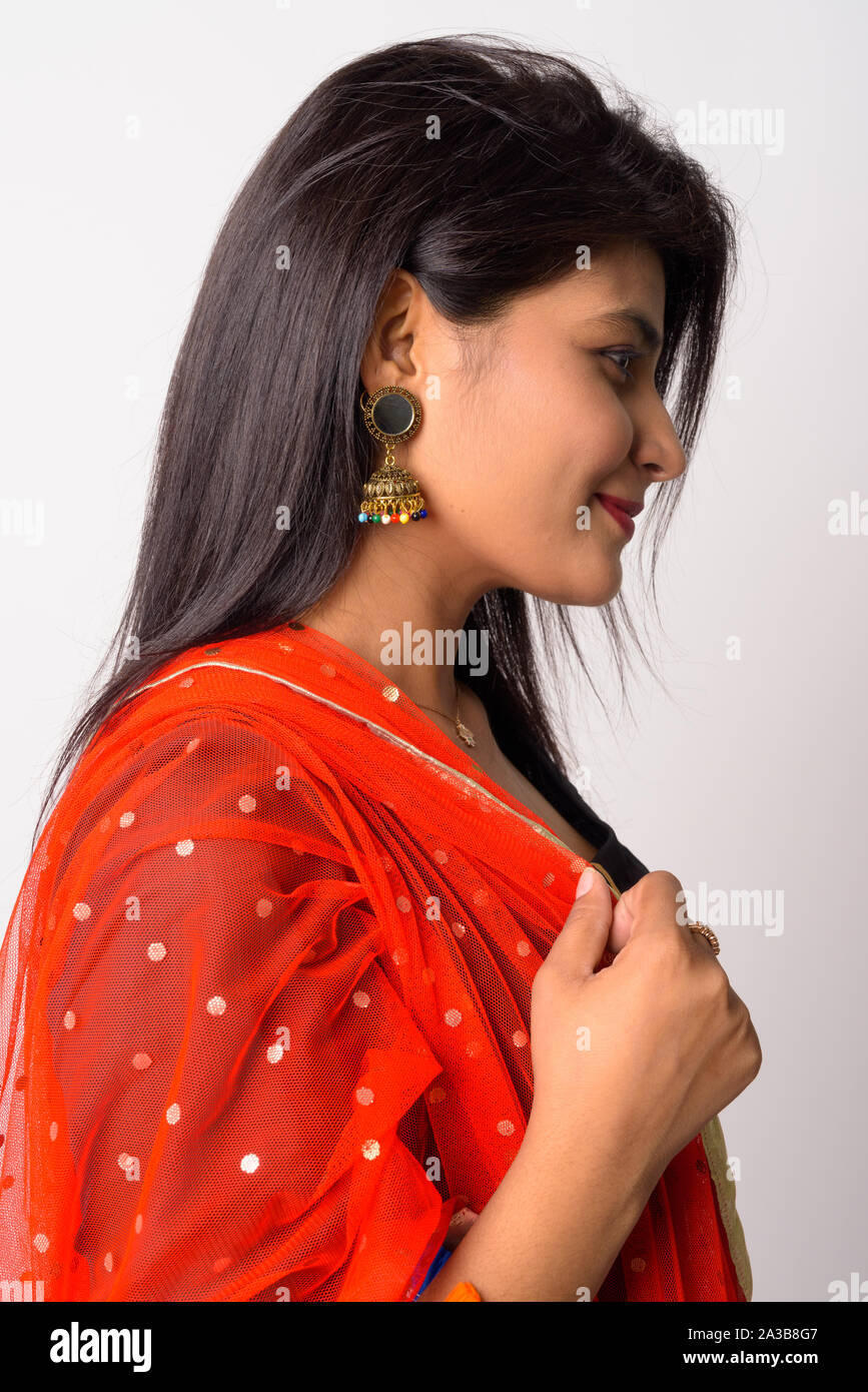 Closeup profile view of young beautiful Persian woman in traditional ...