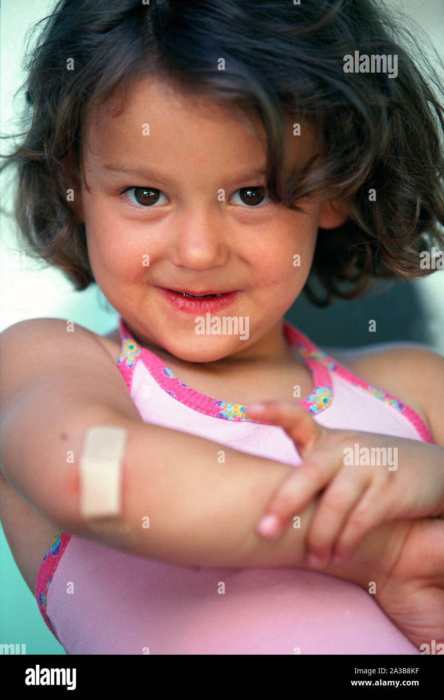 little girl with plaster Stock Photo - Alamy