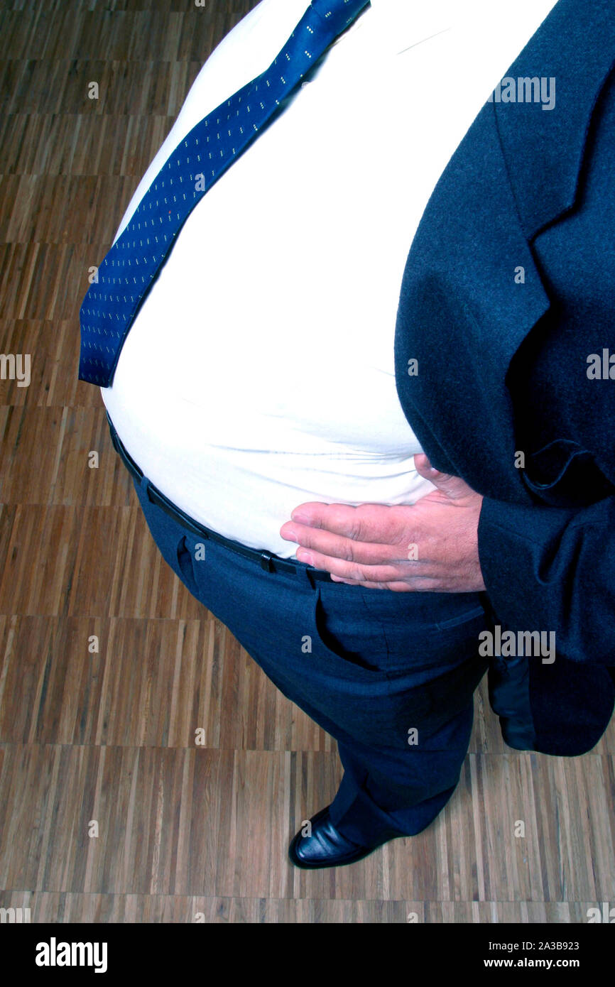 obese man standing up Stock Photo - Alamy