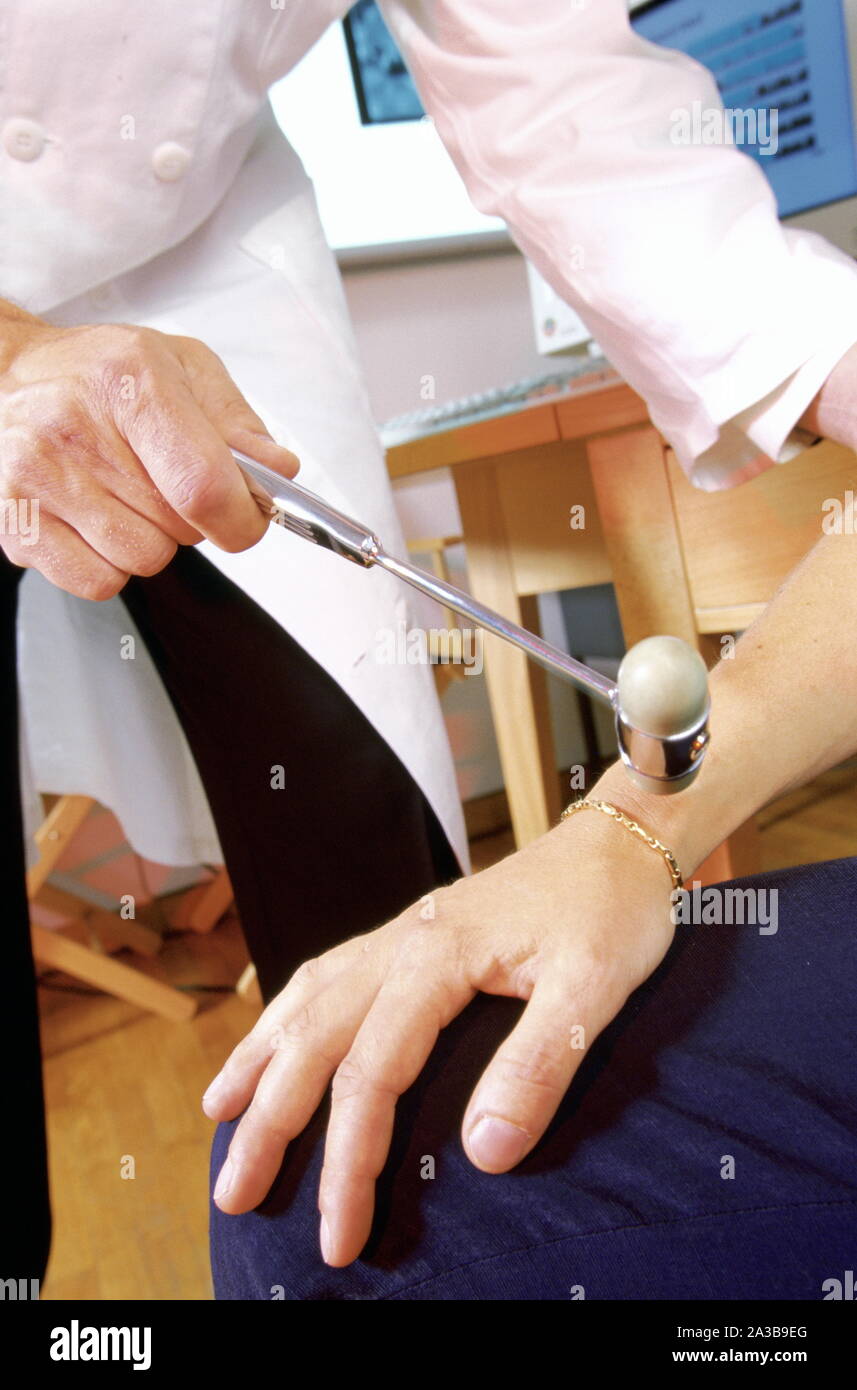 male doctor, action reflex Stock Photo - Alamy