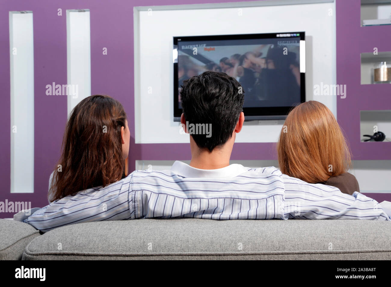 Two men watching tv rear view hi-res stock photography and images - Alamy