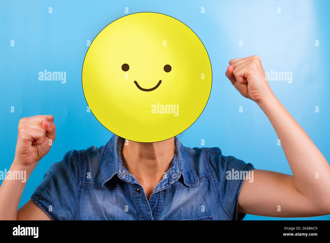 Unrecognizable woman with happy smiley instead of face Stock Photo - Alamy
