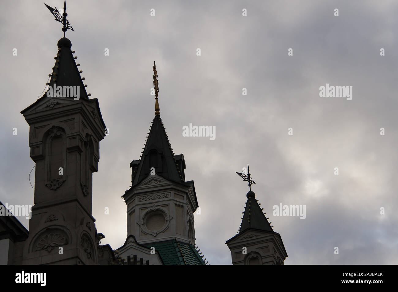 Beautiful stone towers of an old gothic building on the background of ...
