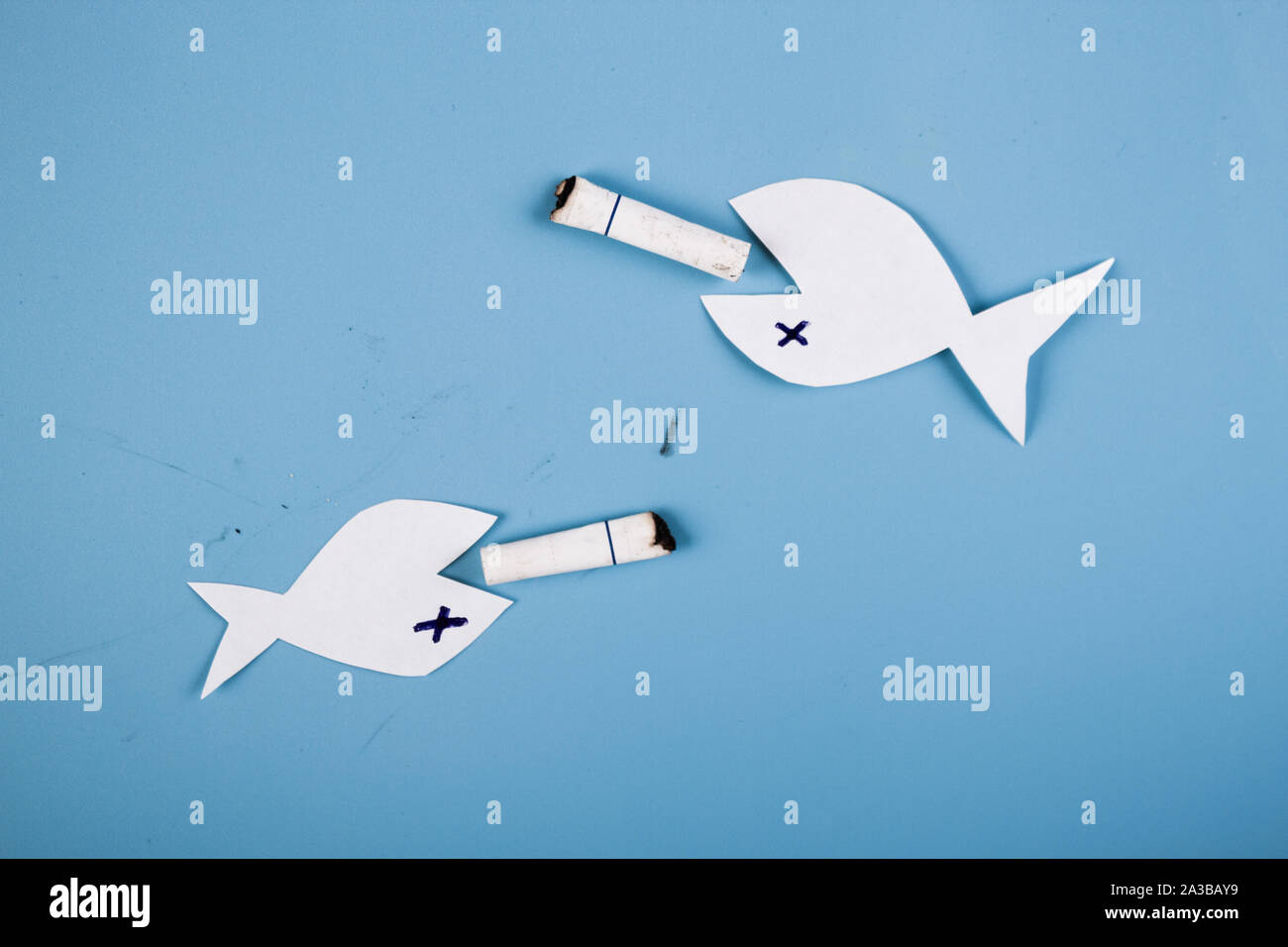 Ocean pollution concept. Fishes smoking cigarettes in ocean Stock Photo ...