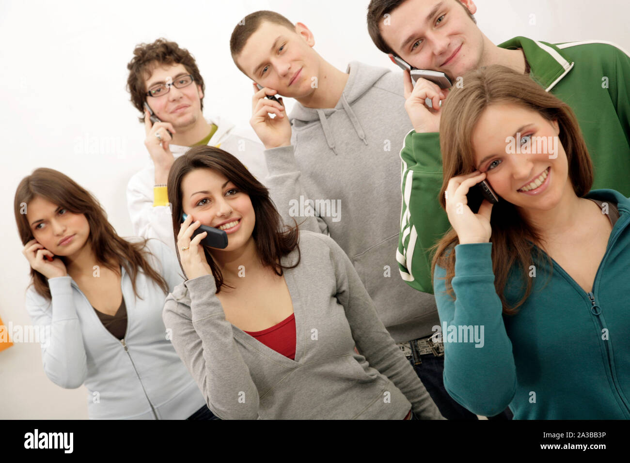 teenagers with mobile phones Stock Photo - Alamy