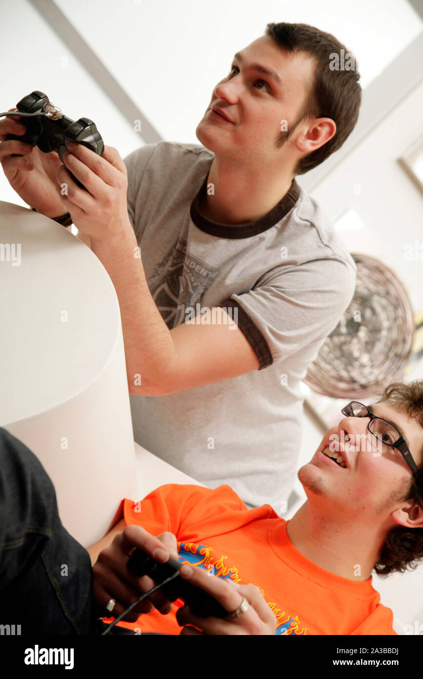 Teenagers playstation hi-res stock photography and images - Alamy