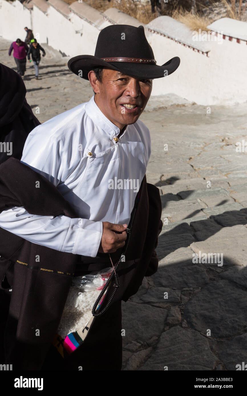 A Tibetan Buddhist pilgrim from the Kham region of eastern Tibet visits ...