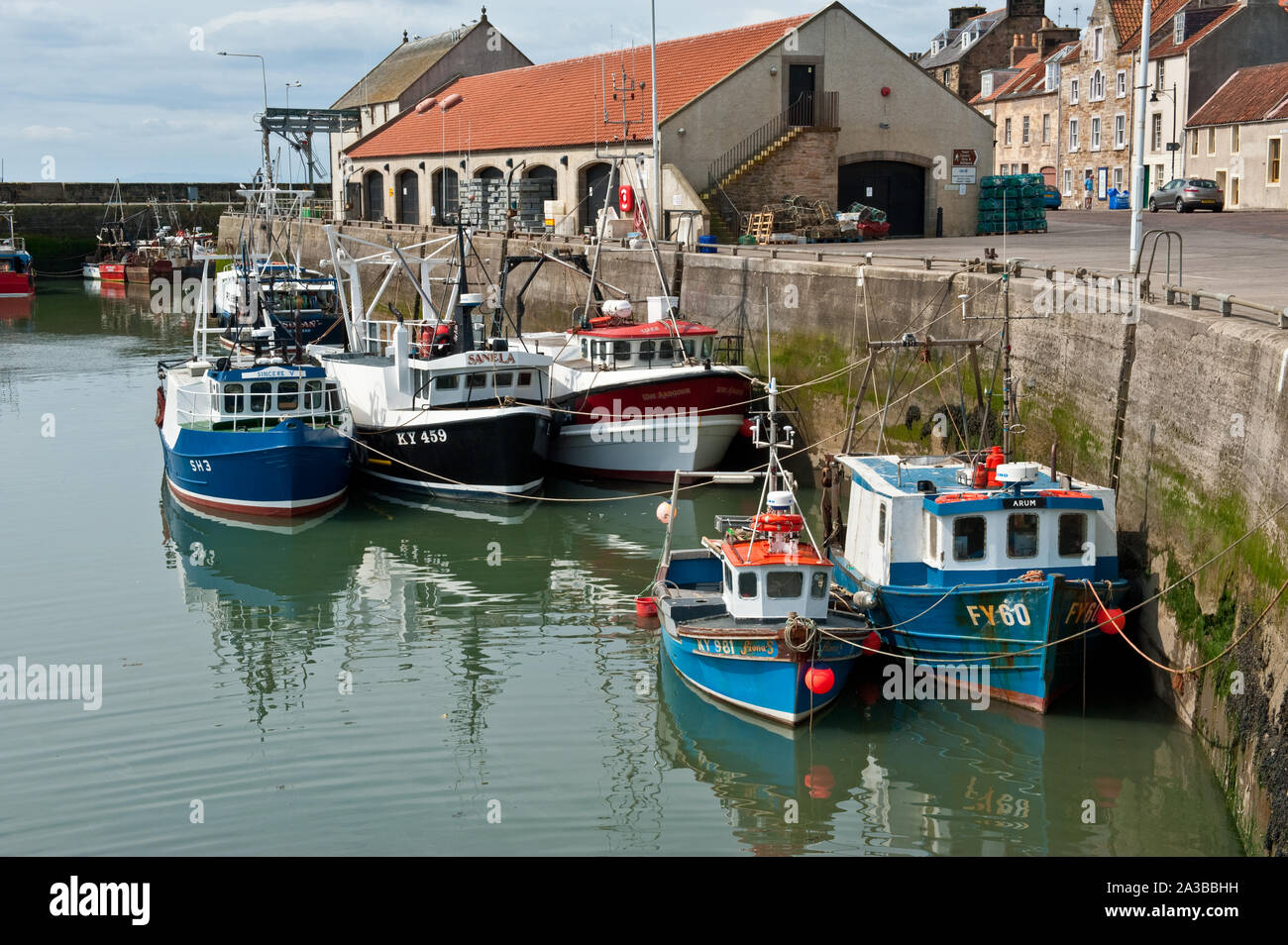 Fishing boats moored in Pittenweem harbour. Fife, Scotland Stock Photo ...
