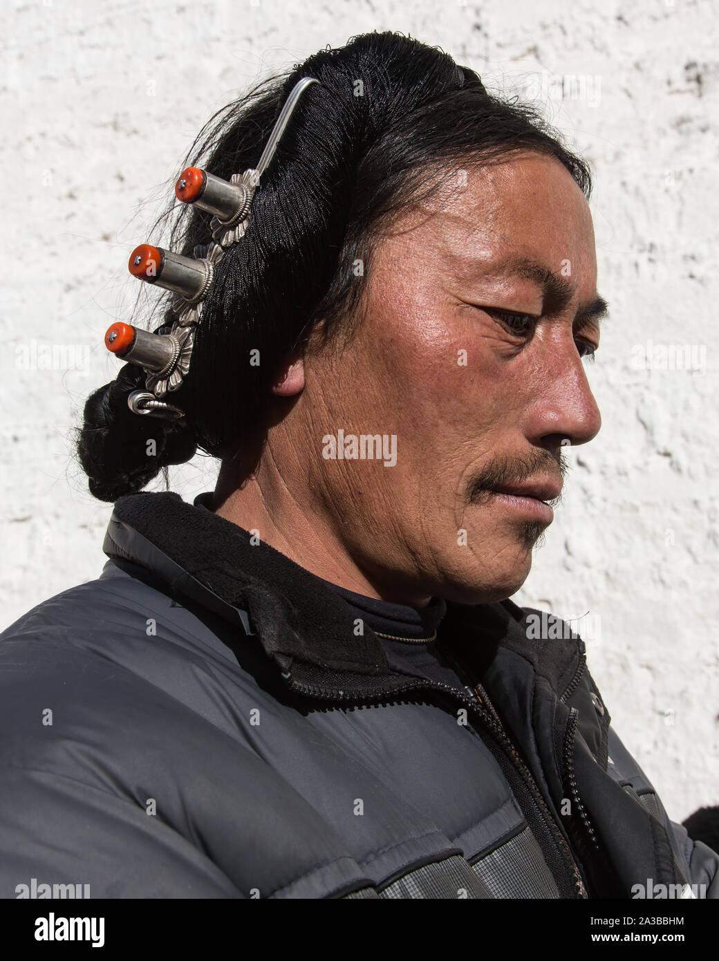 A Tibetan Buddhist pilgrim from the Kham region of eastern Tibet visits ...