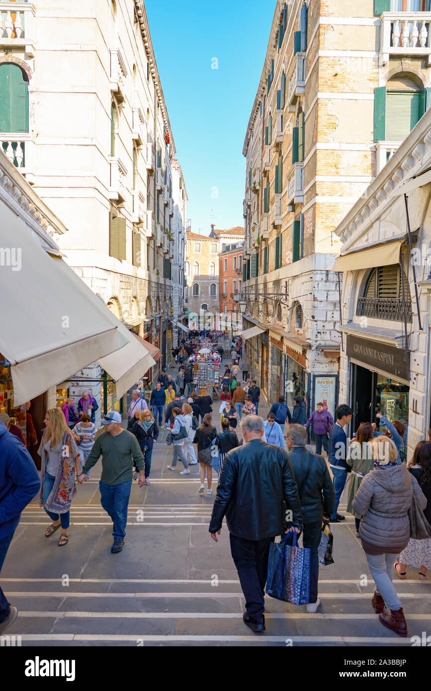 VENICE, ITALY - CIRCA MAY, 2019: diverse people walking on Rialto ...