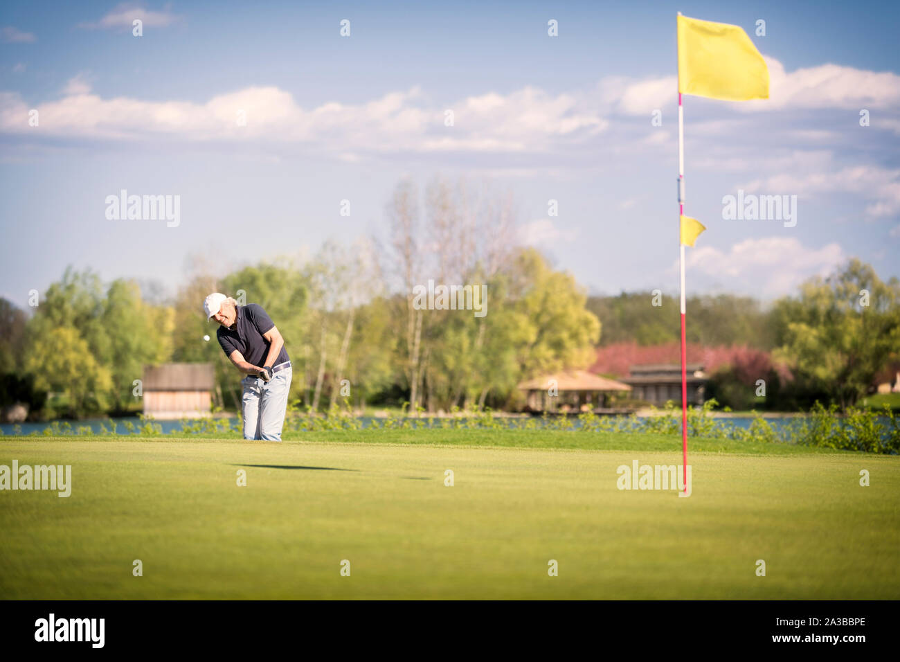Old people playing golf hi-res stock photography and images - Alamy