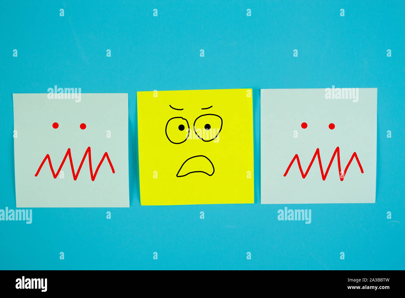 Two bullies attack one peson. Concept image Stock Photo - Alamy