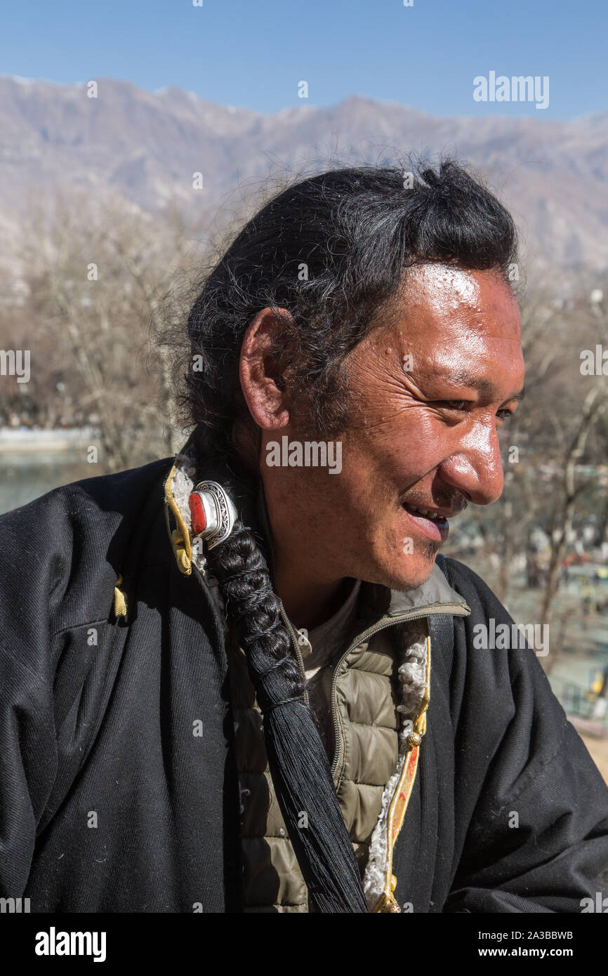 A Tibetan Buddhist pilgrim from the Kham region of eastern Tibet visits ...
