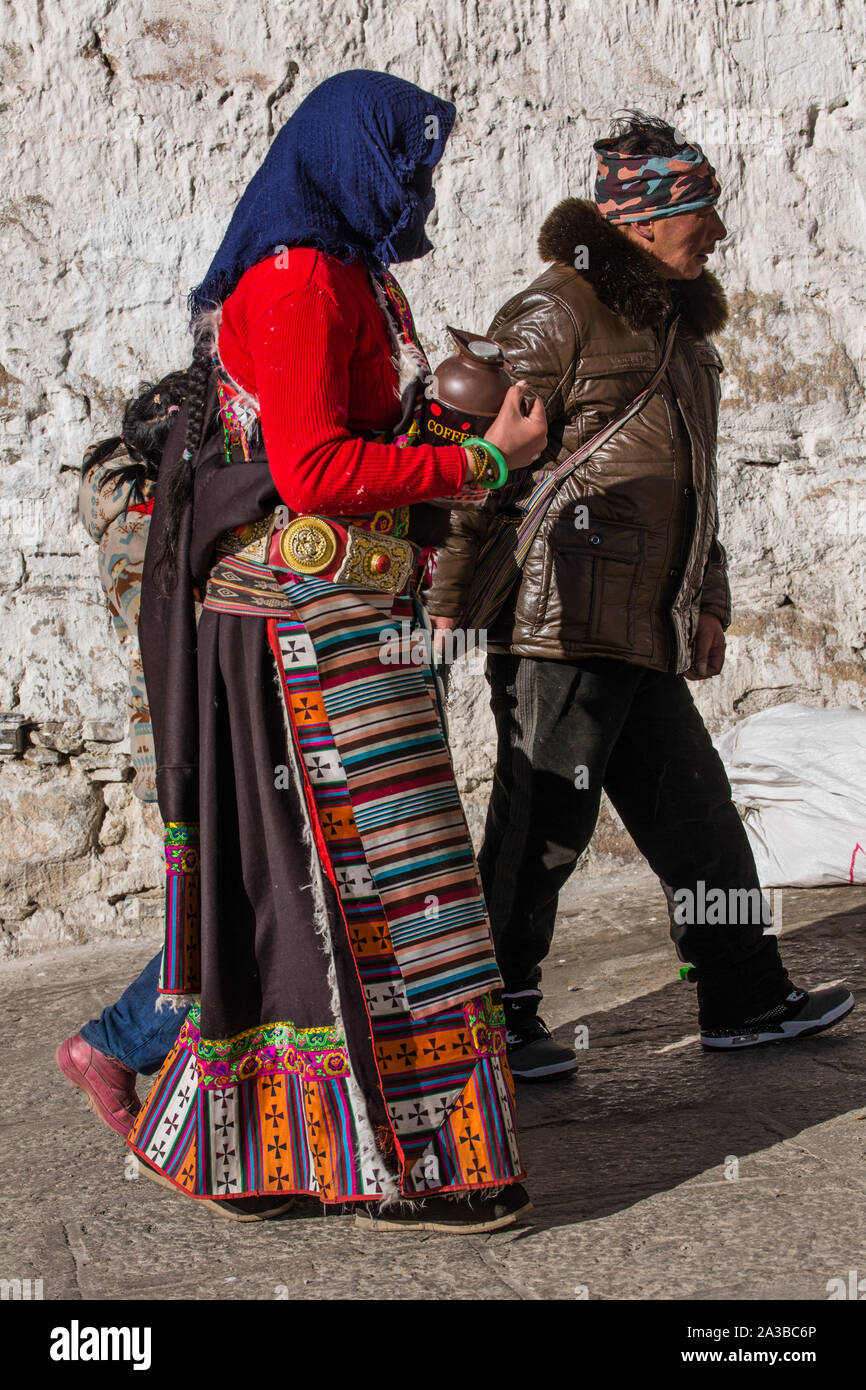 Buddhist pilgrims, a husband and wife from the Kham region of eastern ...