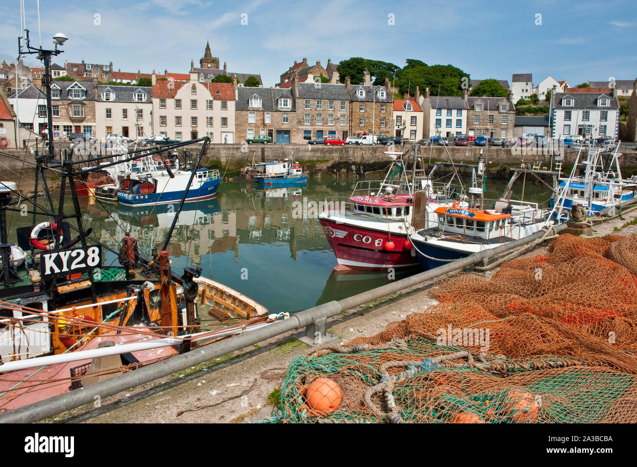 Fishing boats moored in Pittenweem harbour. Fife, Scotland Stock Photo ...