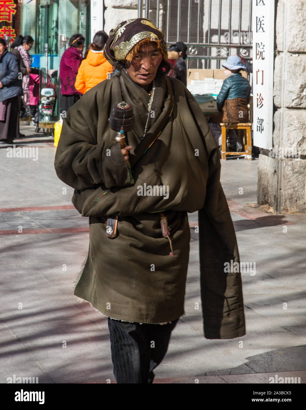A Tibetan Buddhist pilgrim from the Kham region of Tibet ...