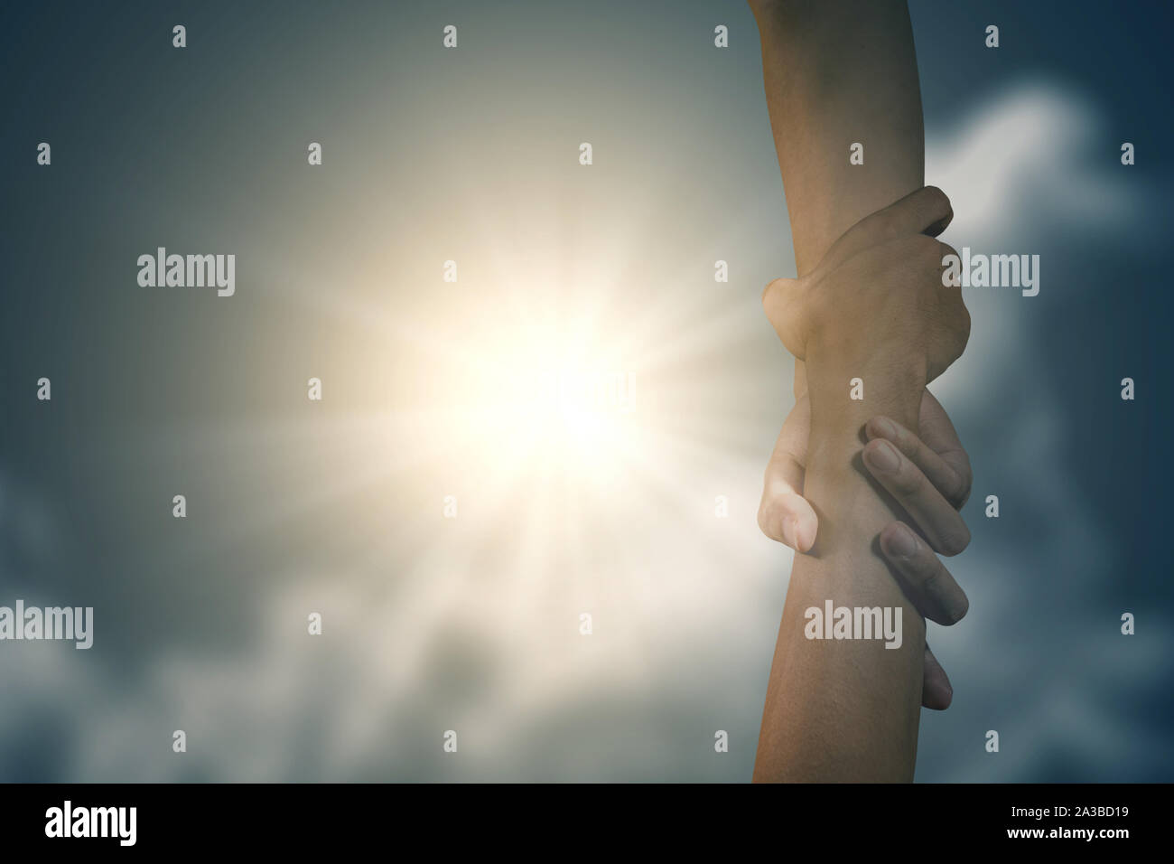 God giving a helping hand to human with sunlight background Stock Photo ...