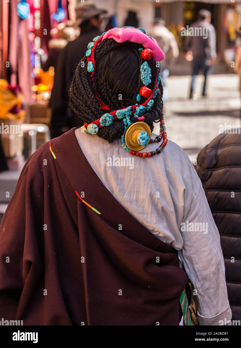A Khamba Tibetan woman from the Kham region of eastern Tibet with her ...
