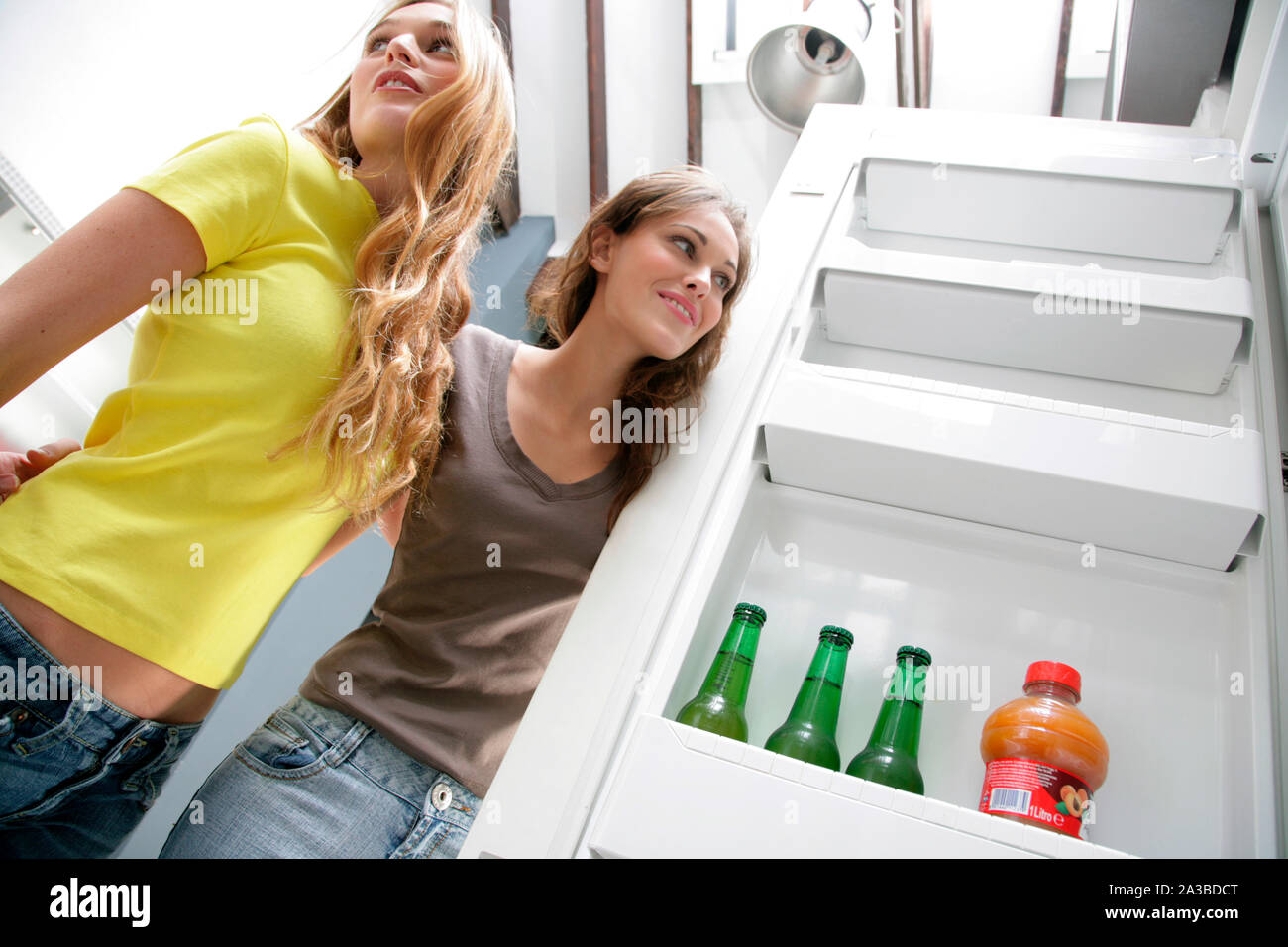women and refrigerator Stock Photo - Alamy