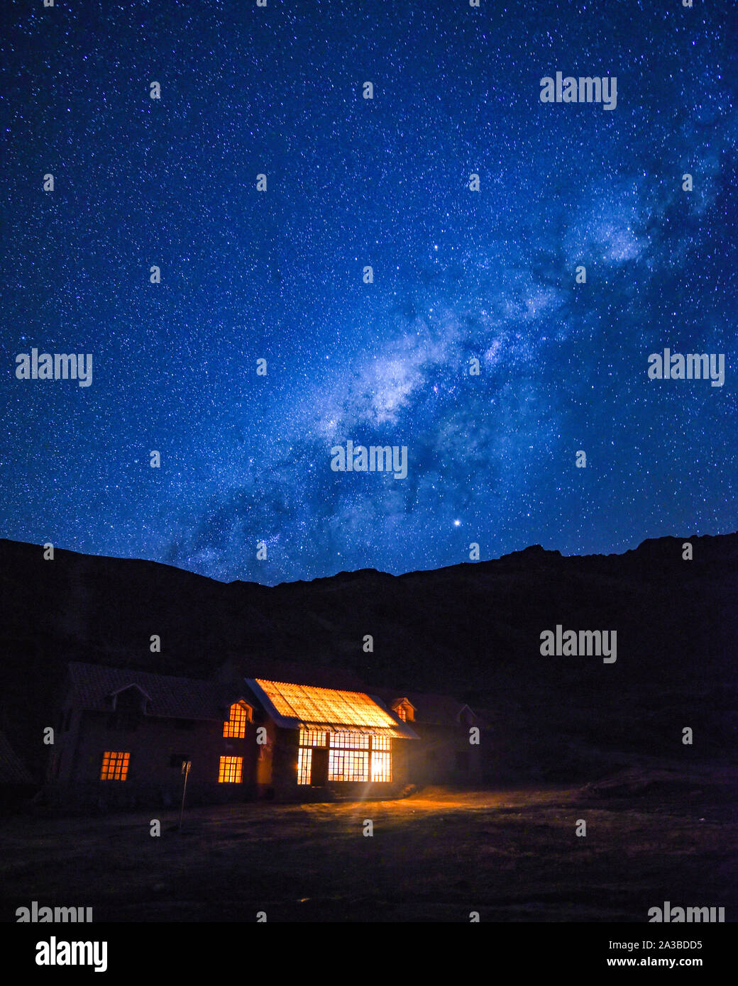 Milky Way and starry skies over a lodge in the Andes mountains. Cusco ...