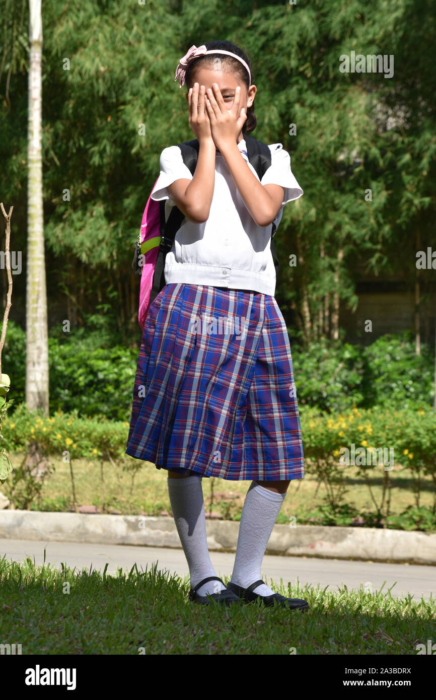 Young Filipina Girl Student And Fear Wearing Uniform With Notebooks ...