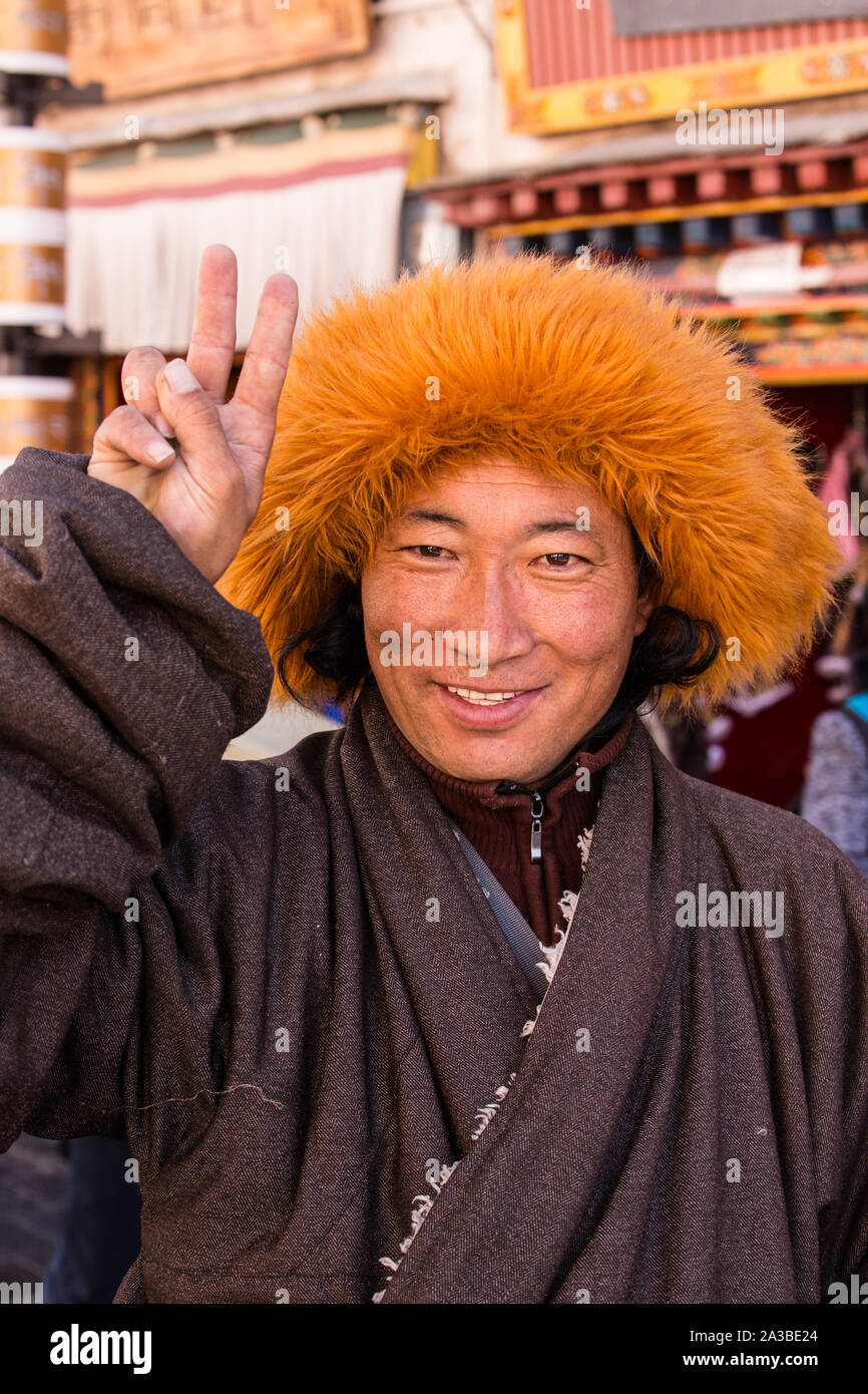 A Tibetan Buddhist pilgrim from the Kham region of eastern Tibet ...