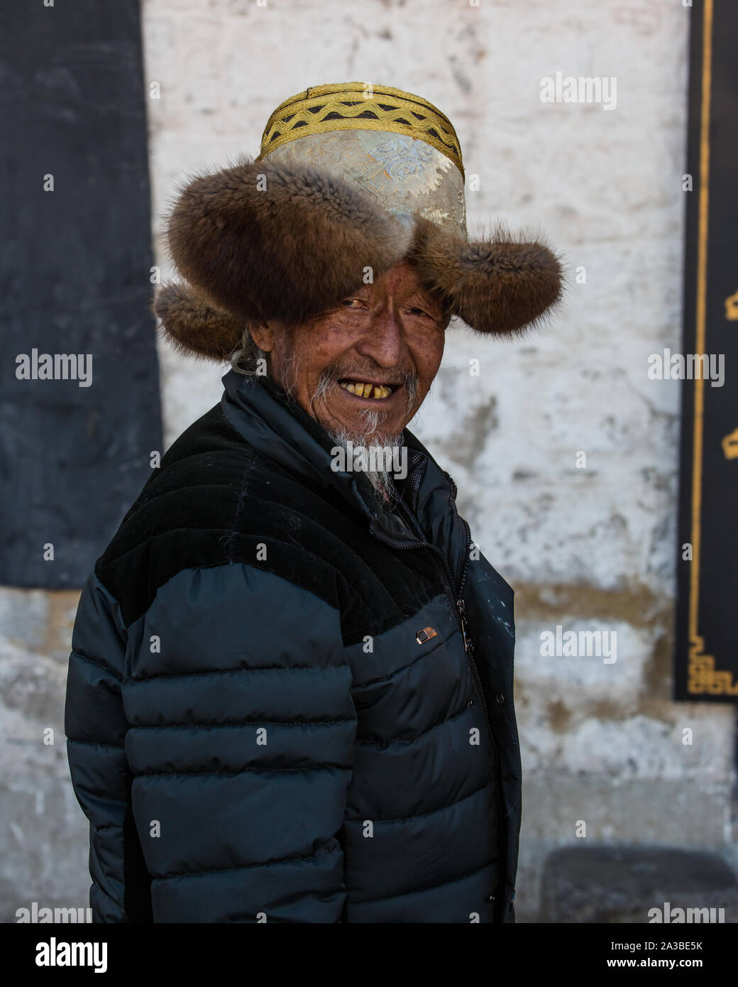 A Tibetan Buddhist pilgrim from the Kham region of eastern Tibet ...