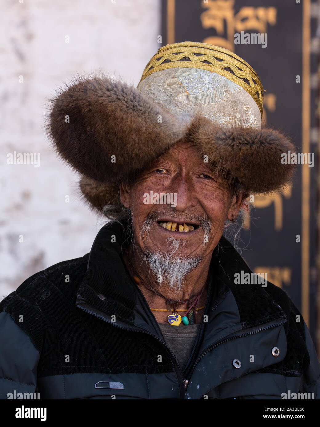 A Tibetan Buddhist pilgrim from the Kham region of eastern Tibet ...
