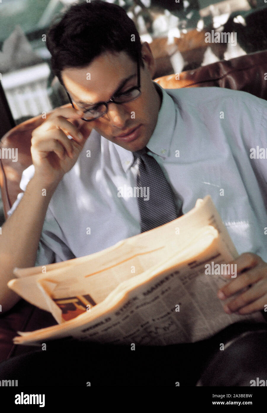 Manager reading a magazine hi-res stock photography and images - Alamy