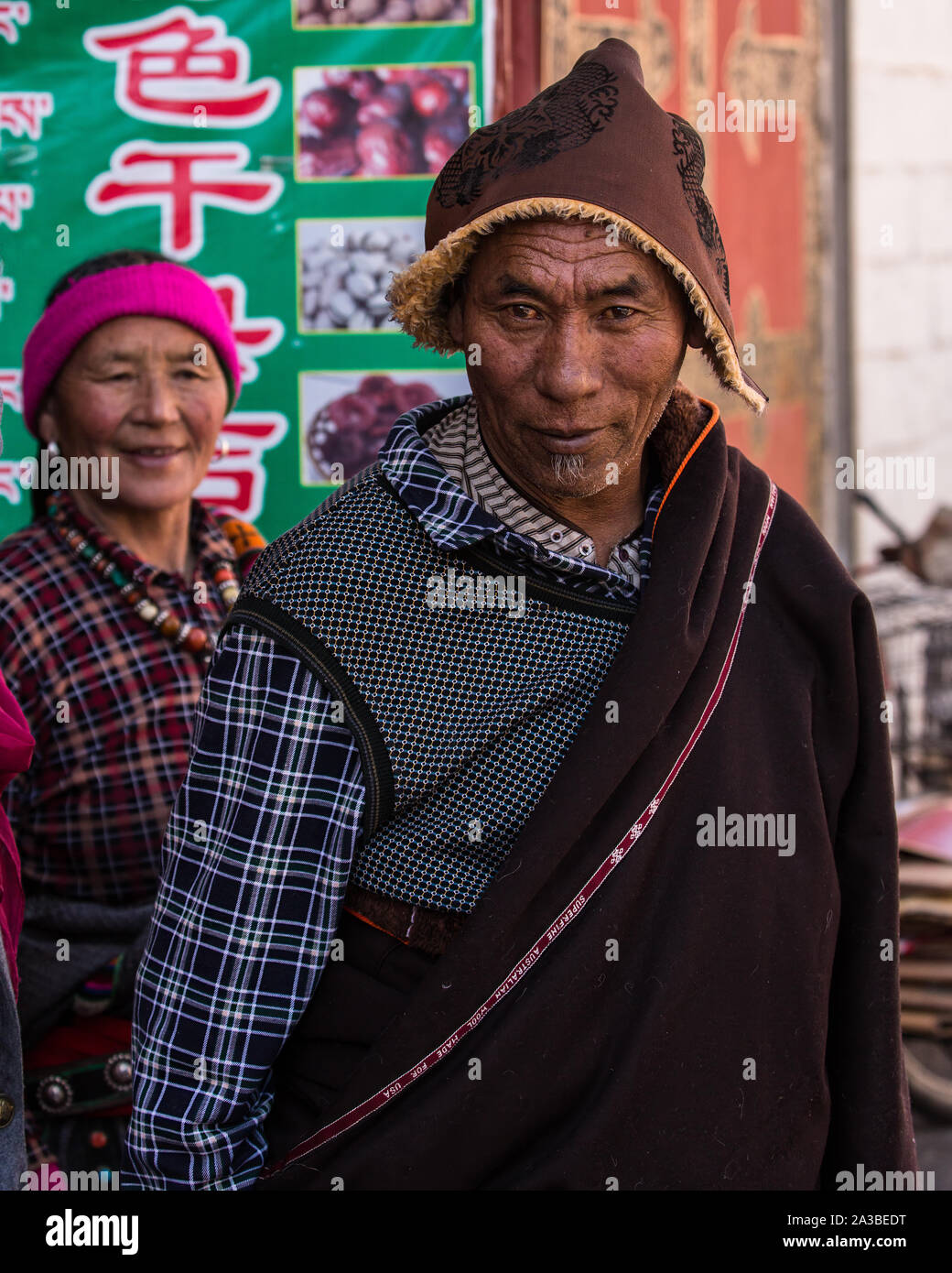 A Tibetan Buddhist pilgrim from the Kham region of eastern Tibet ...