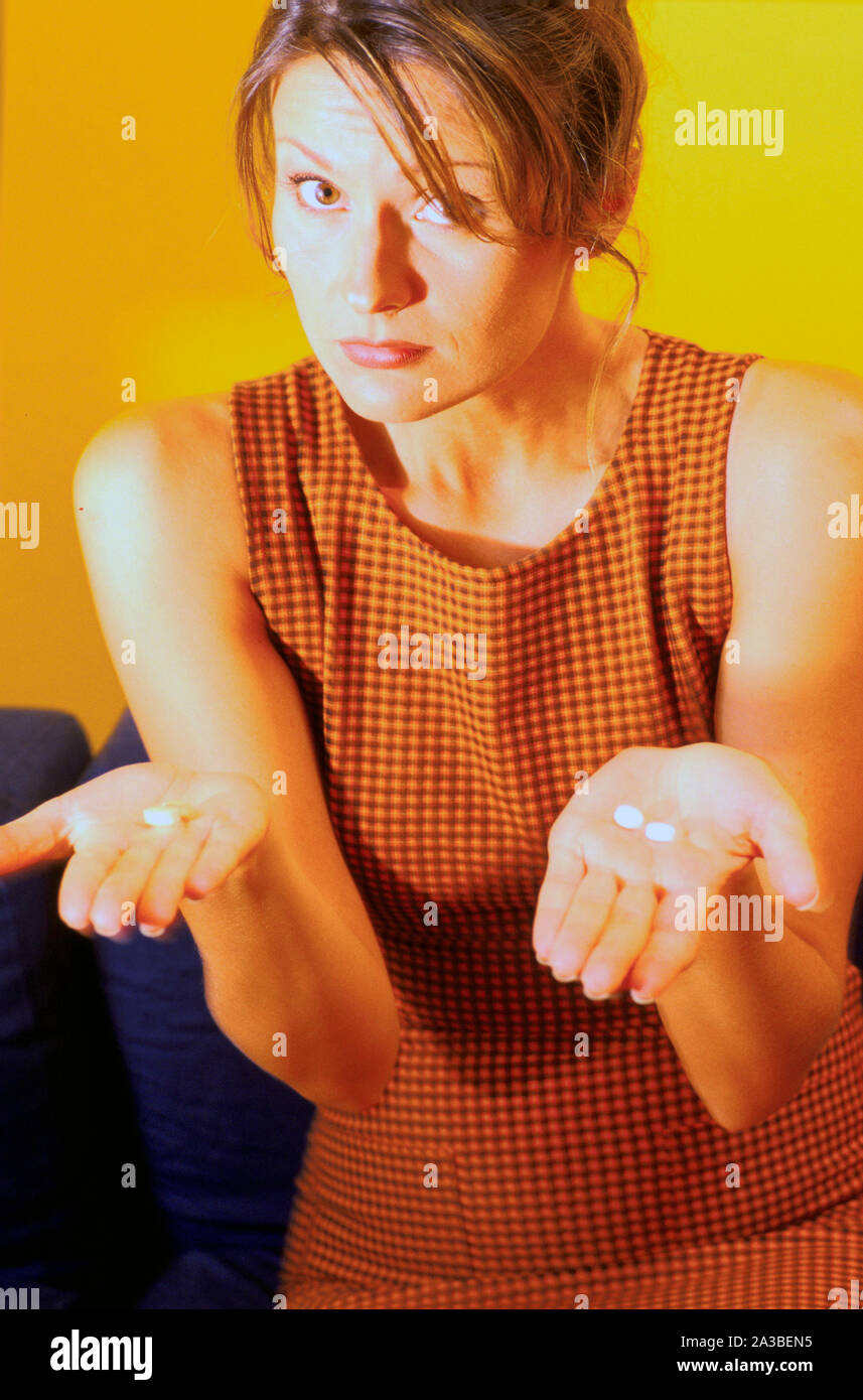 Woman undecided looking at camera hi-res stock photography and images ...