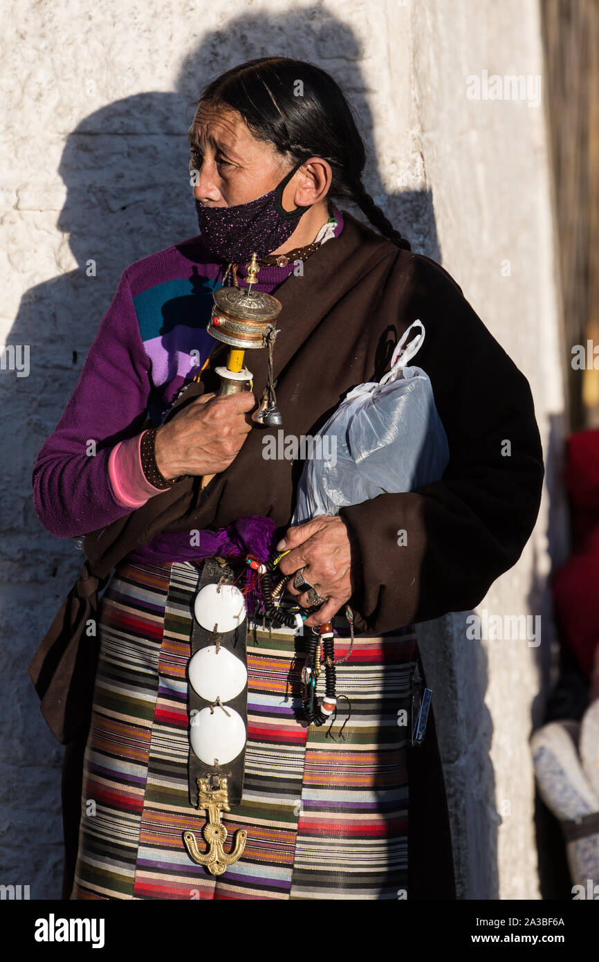 A Khamba Tibetan woman from the Kham region of eastern Tibet on a ...