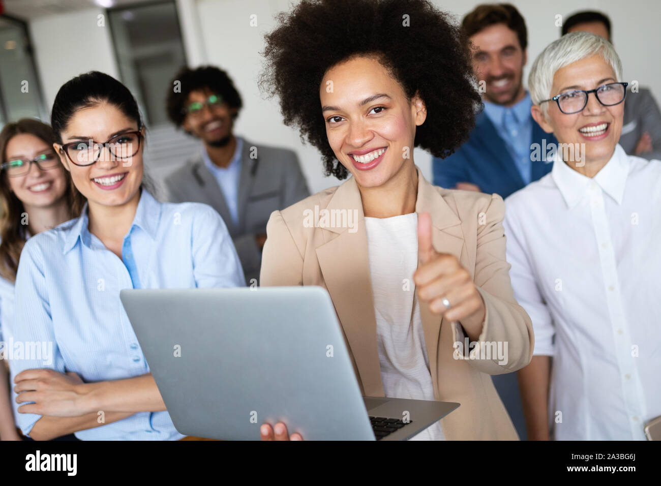 Business team celebrating a good job in the office Stock Photo - Alamy