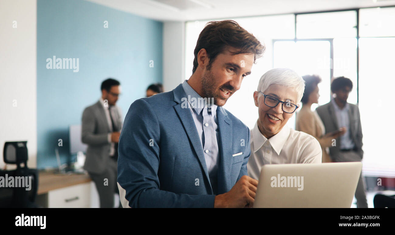 Successful business group of people at work in office Stock Photo - Alamy