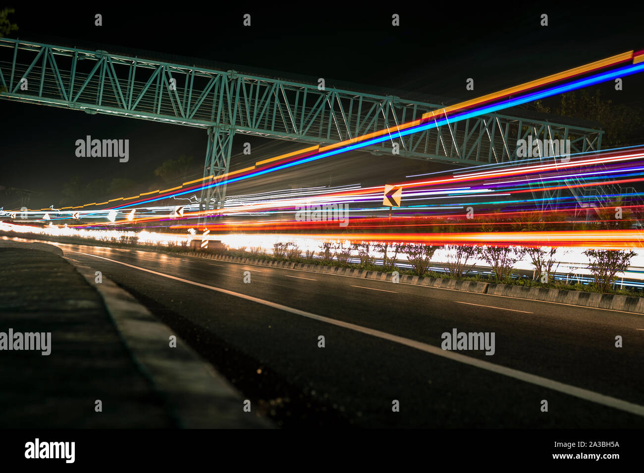 Long exposure photograph of vehicles on Indian national highway. A shot ...
