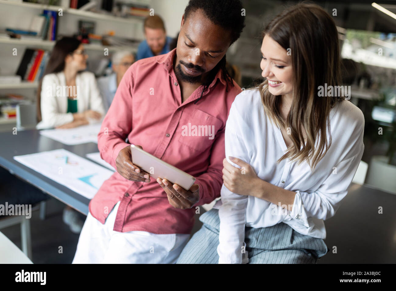 Programmer working in a software developing company office Stock Photo ...