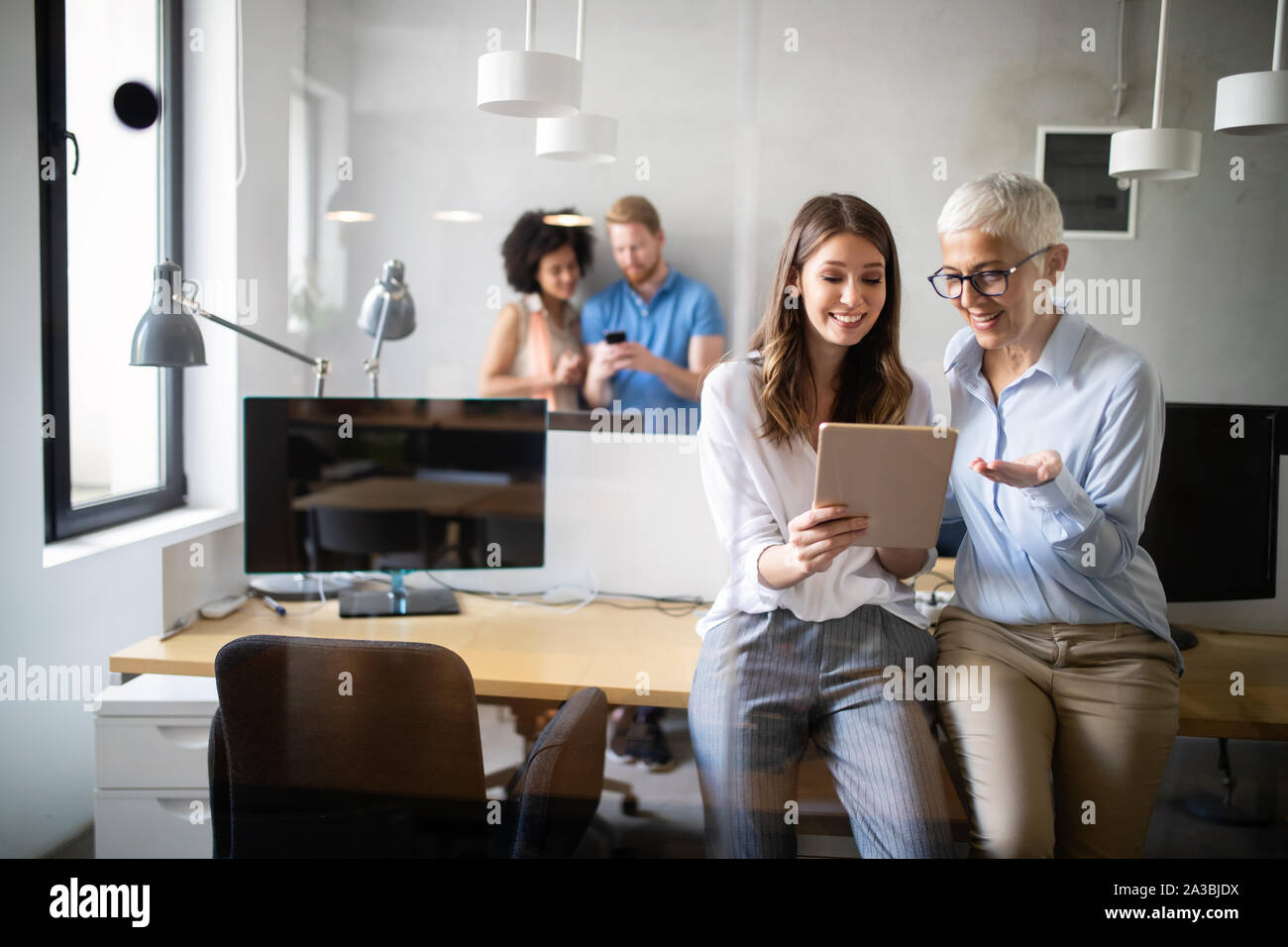Programmer working in a software developing company office Stock Photo ...