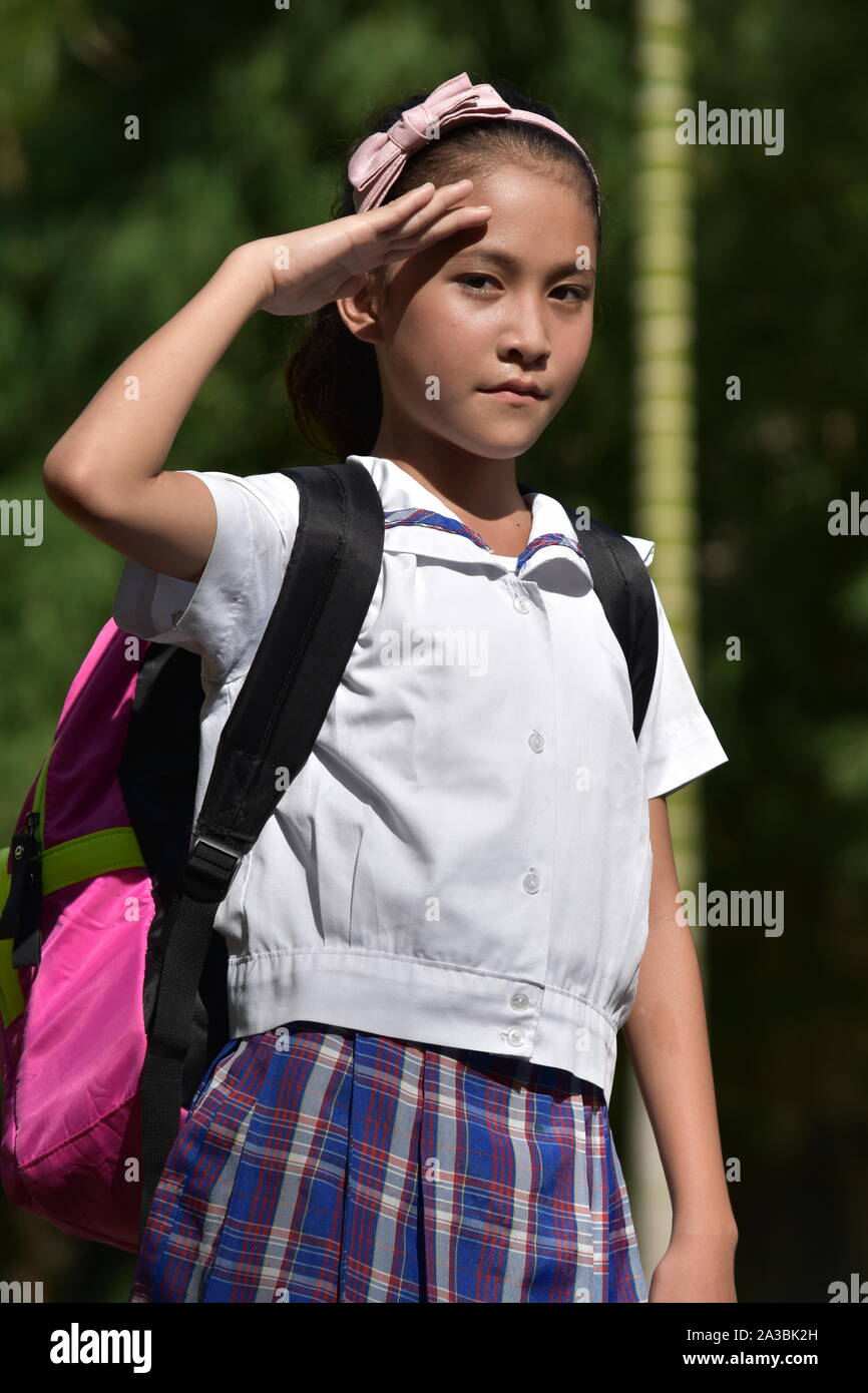Catholic Diverse Female Student Saluting Wearing Uniform Stock Photo ...