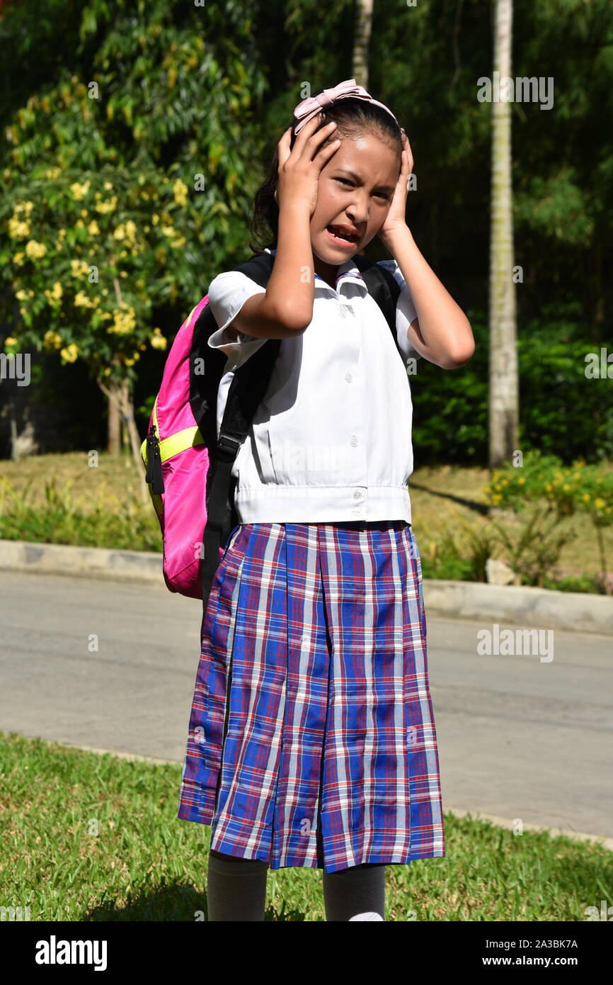 An Anxious Female Student Wearing Uniform Stock Photo - Alamy